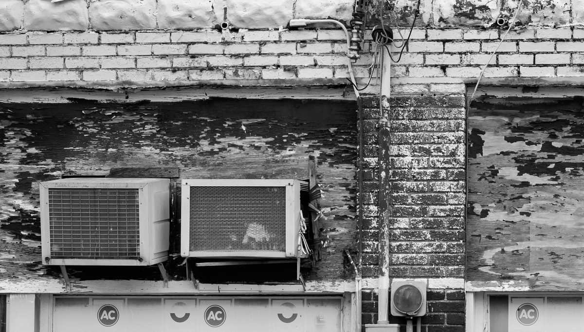 Black and white photograph of an old auto parts storefront - Shadows ...